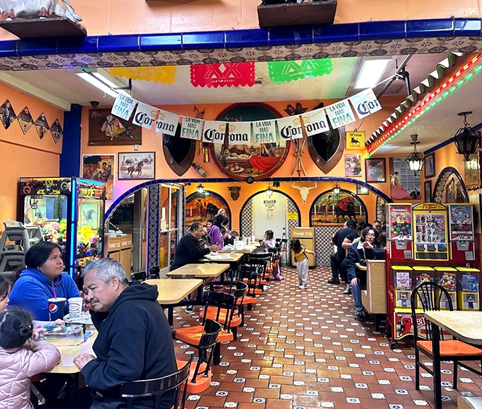 Where locals and food pilgrims unite under Corona banners, bonded by their mutual appreciation for authentic Mexican flavors.