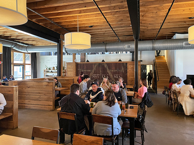Conversations flow as freely as the craft beer in this bustling dining room, where strangers at neighboring tables might just become friends over shared plates.