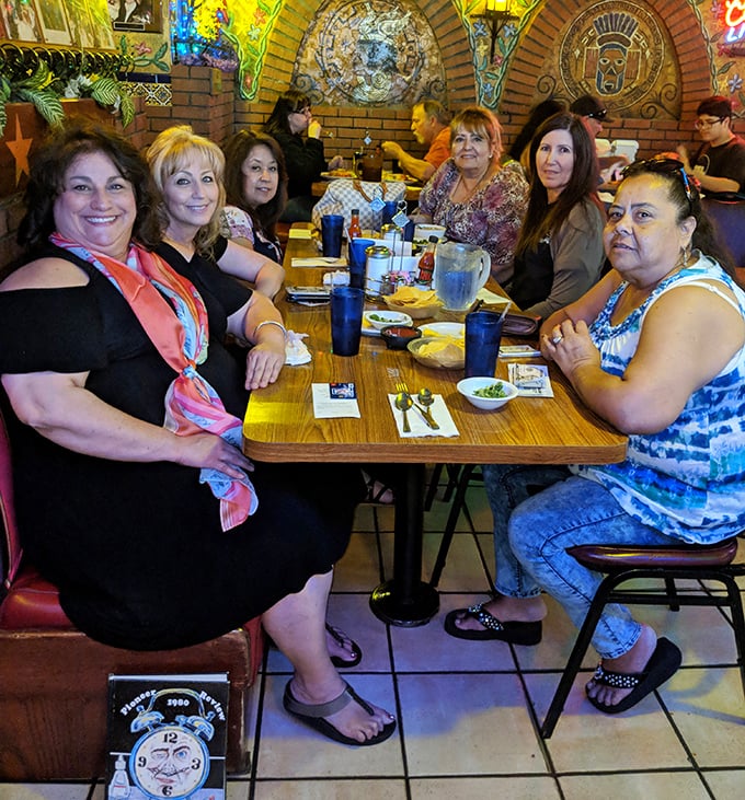 Happy diners sharing meals and creating memories that'll last longer than their food comas.