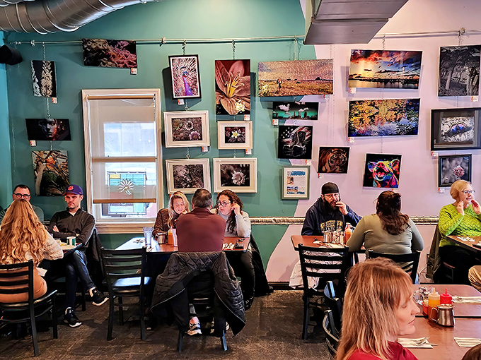 Local artwork transforms this dining room into a gallery where the only thing more colorful than the walls is the conversation.