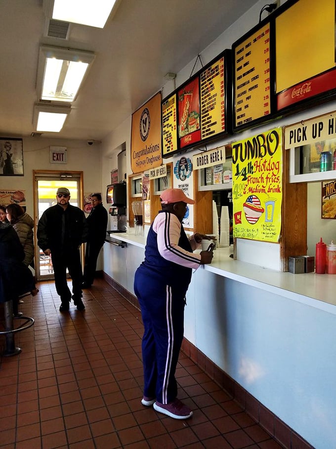 The lunch counter ballet&mdash;customers ordering, waiting, anticipating. Every Chicago neighborhood has a place like this where life's rhythms play out daily.