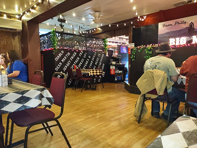 Where strangers become friends over shared cheesesteak experiences. The dining room's warm wood tones make everyone feel like a regular. 