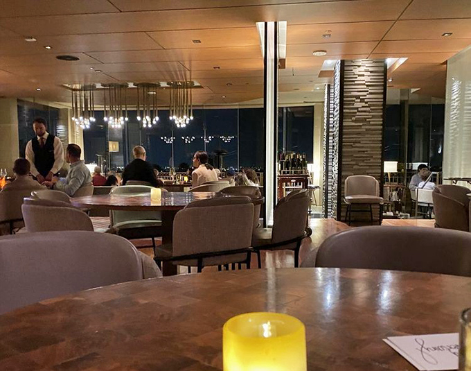 Evening elegance where conversations flow as smoothly as the wine. The kind of space where "just one more bite" becomes the evening's most repeated phrase.