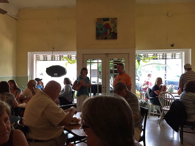 Happy diners enjoying the kind of meal that turns strangers into friends over shared appreciation for excellence.