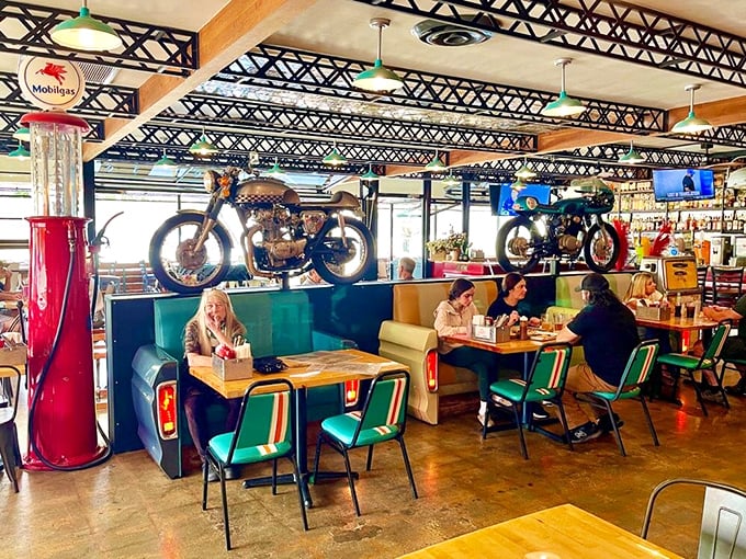 The vintage gas pump stands sentinel as diners dive into their meals. Some restaurants have ambiance&mdash;this place has personality.
