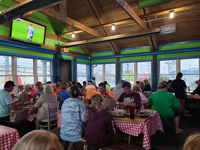 A packed house of happy diners, all united in the universal language of "I can't believe how good this is" facial expressions.