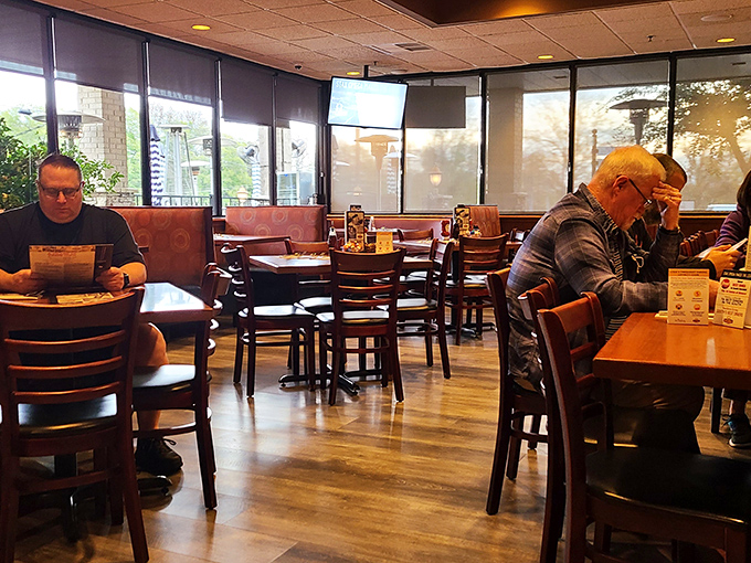 Regulars know the secret&mdash;this isn't just eating, it's community gathering disguised as a meal in a comfortable booth.