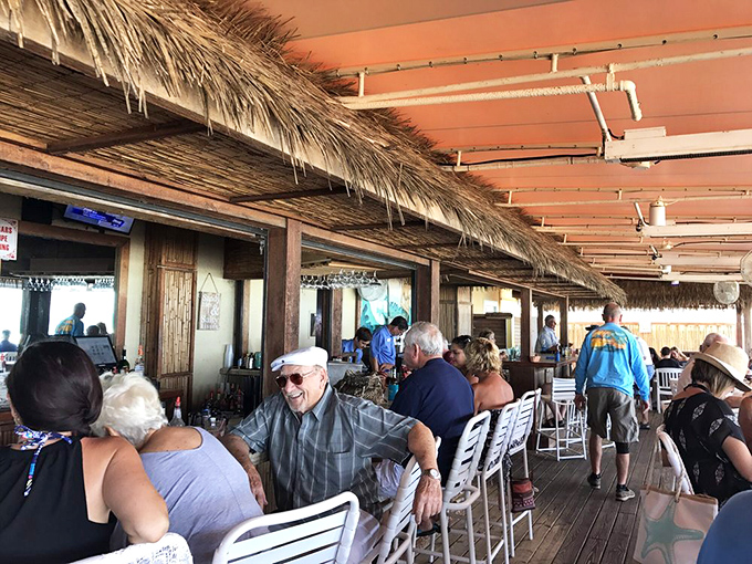 The thatched outdoor area offers that quintessential Florida dining experience &ndash; where the atmosphere is as nourishing as the food itself.