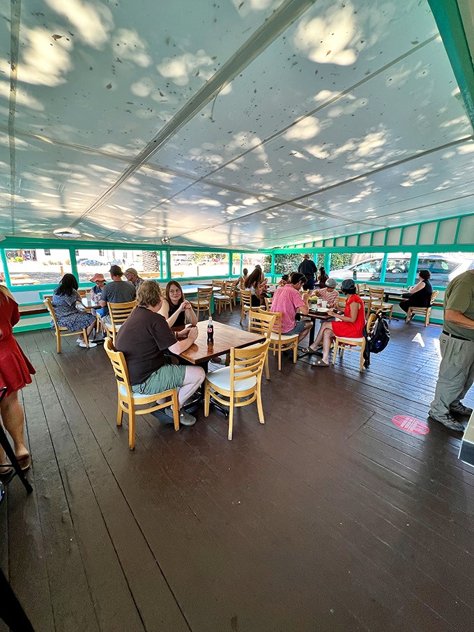 Strangers become temporary friends united by the universal language of "oh my goodness, you have to try this." Food brings people together.