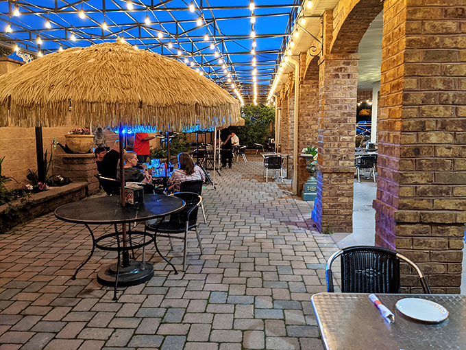 String lights and thatched umbrellas transform JoJo's patio into an unexpected escape. Who needs a European vacation when Pennsylvania delivers this evening ambiance?