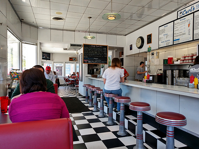 Morning rituals unfold at Carl's counter, where regulars don't need menus and coffee appears magically before the seat gets warm.