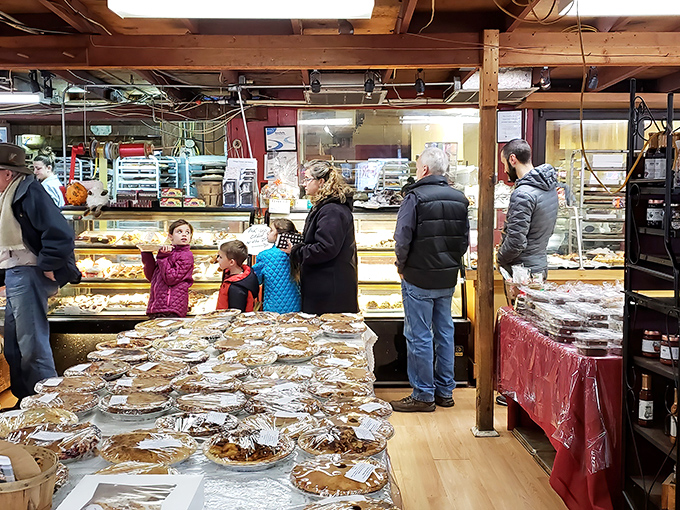 The bakery counter on a busy day &ndash; where strangers become friends united by the universal language of "I'll take two of those."