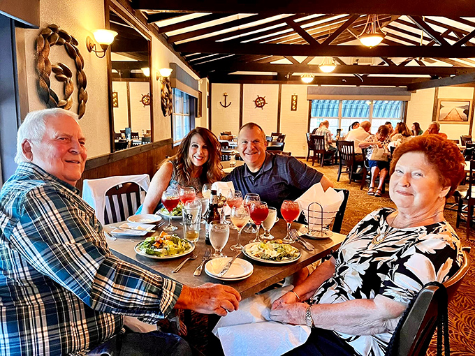 Happy diners raise their glasses in that universal gesture that says, "This place was absolutely worth the drive."