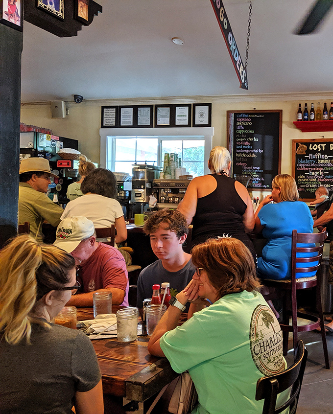 Where strangers become friends over coffee and eggs. The bustling interior captures that perfect breakfast buzz of anticipation.