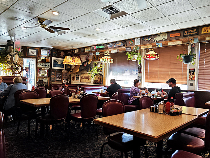 Where locals and tourists break bread in burgundy booths. The hanging plants add a touch of California to this timeless diner atmosphere.