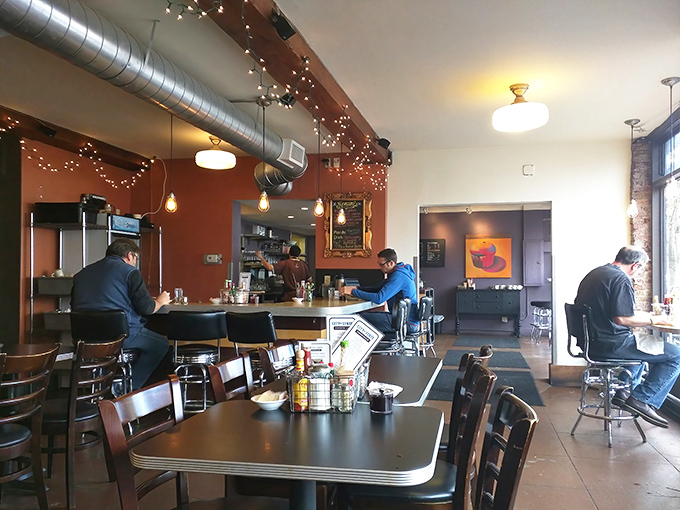 Warm walls, exposed ductwork, and happy diners&mdash;the universal language of "good food happens here" needs no translation.