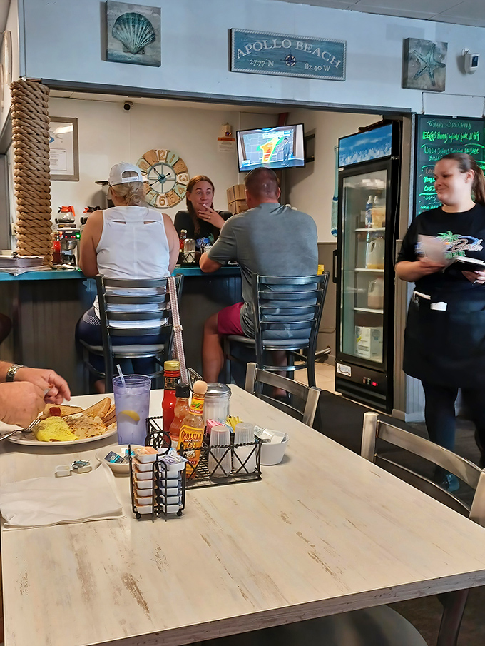 Where locals gather to solve the world's problems over eggs and coffee. The real Florida social network has always been the neighborhood diner.