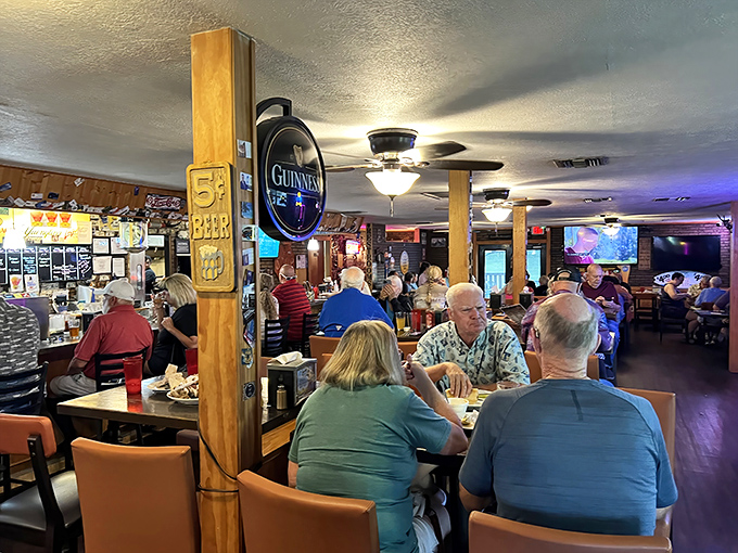 The dining room hums with the satisfied murmurs of people making memories over meat. Notice nobody's looking at their phones—the food has their full attention.