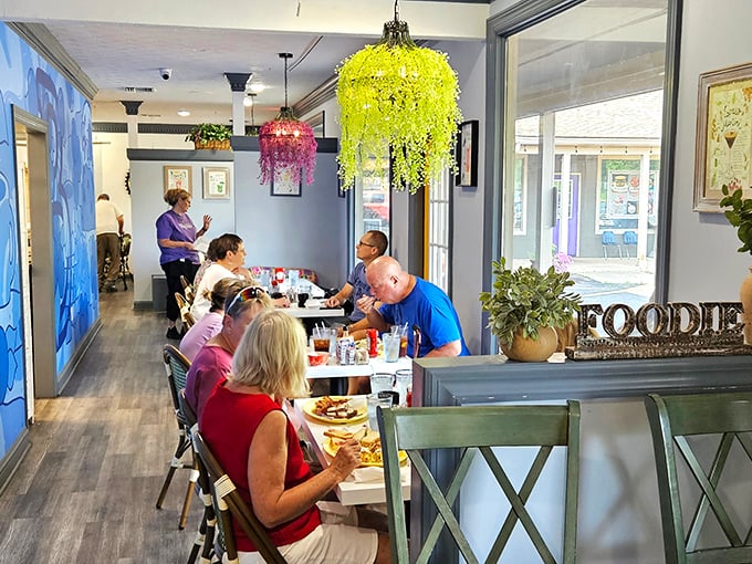 Happy diners enjoying their breakfast bounty in an atmosphere that feels like visiting family.