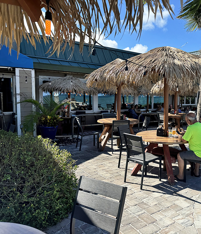 The outdoor patio with its rainbow of Adirondack chairs offers the quintessential Florida dining experience – ocean views with a side of gentle sea breeze.