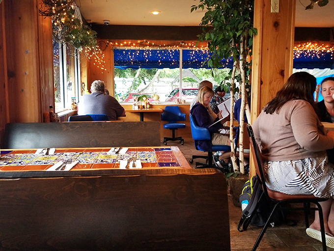 Where strangers become friends over shared food recommendations. The blue chairs have witnessed countless "you've got to try this" moments.