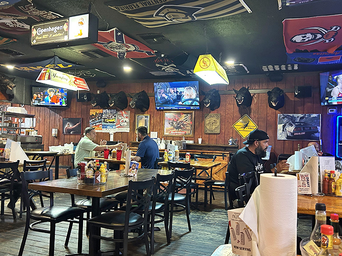 Where locals gather to escape Florida's heat and embrace its flavors. The TVs are always on, but the food is the real entertainment.