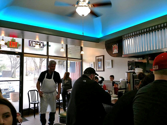 The morning dance of servers and customers&mdash;a choreography perfected over years. That apron-clad maestro orchestrates breakfast service with seasoned precision.