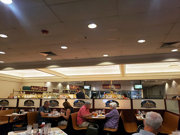 Patrons enjoying their meals in comfortable booths. The quiet hum of satisfaction is the restaurant's most authentic background music.