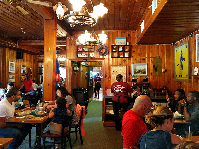 The true measure of a great restaurant: happy people too busy eating to notice they're being photographed. Community happens over home fries.