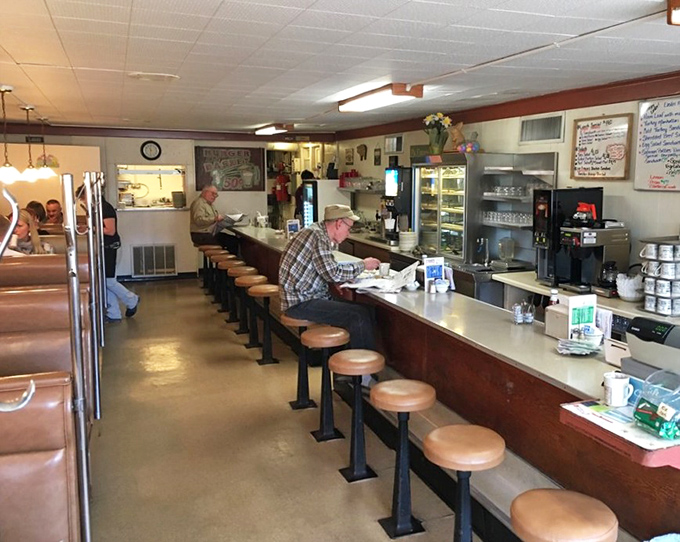 Counter culture at its finest – where regulars gather for coffee, conversation, and the daily pie report.
