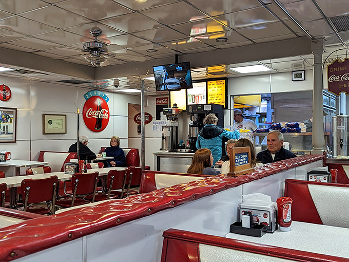 The counter and booths create the perfect backdrop for that uniquely American ritual: solving the world's problems over endless cups of coffee.