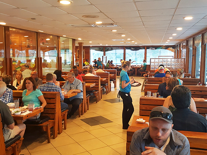A bustling dining room where conversations compete with the sounds of cracking shells. Everyone here is united by a common mission: seafood bliss.