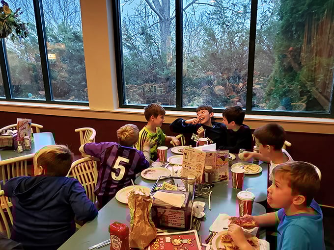 Family memories being made one slice at a time—these kids will remember this table long after they've forgotten their passwords.