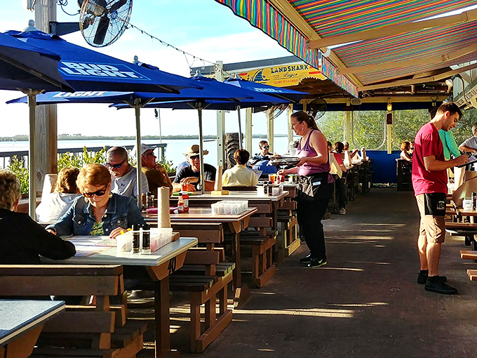 The bar at JB's doesn't need mixologists with waxed mustaches &ndash; just cold beer, honest pours, and that neon glow promising good times ahead.