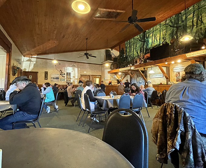 Generations gather under wooden beams, creating memories seasoned with laughter and the shared pleasure of a meal worth driving for.