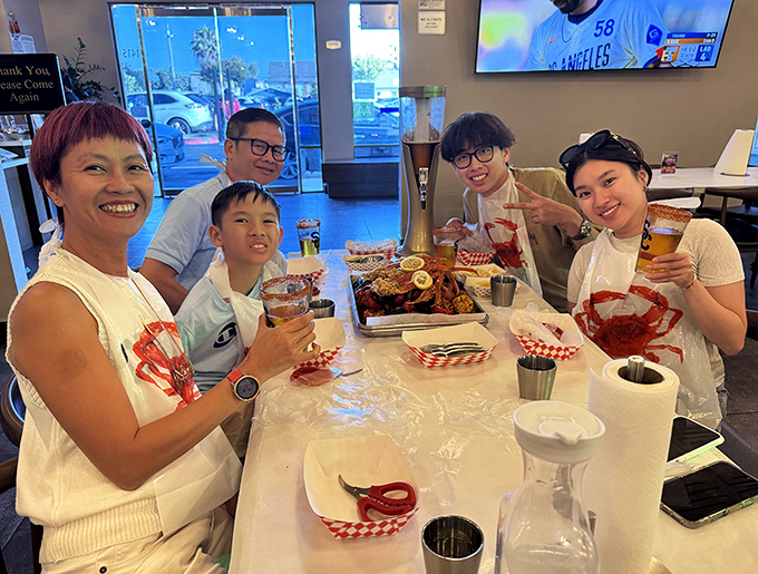 The true sign of a great seafood joint: happy diners in bibs, ready to get messy with their meal.