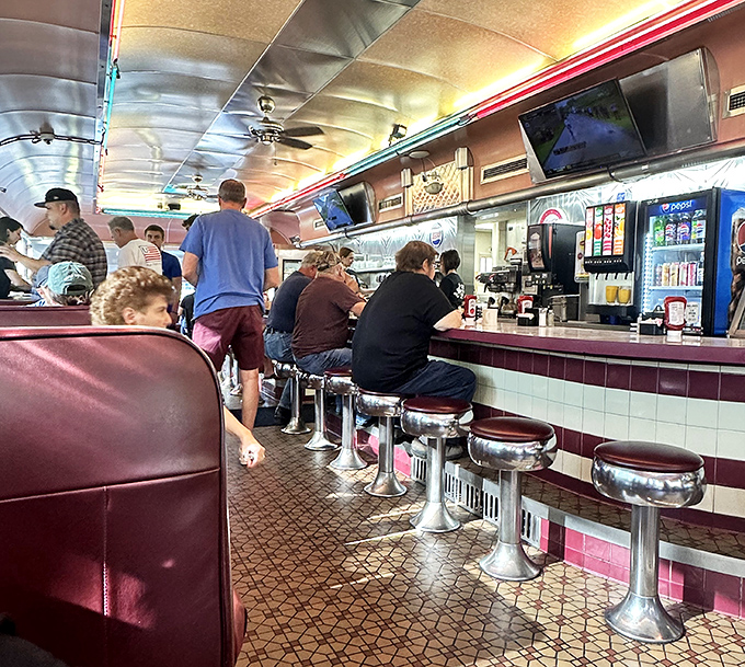 The counter crowd knows something special &ndash; this is where the real diner magic happens daily.