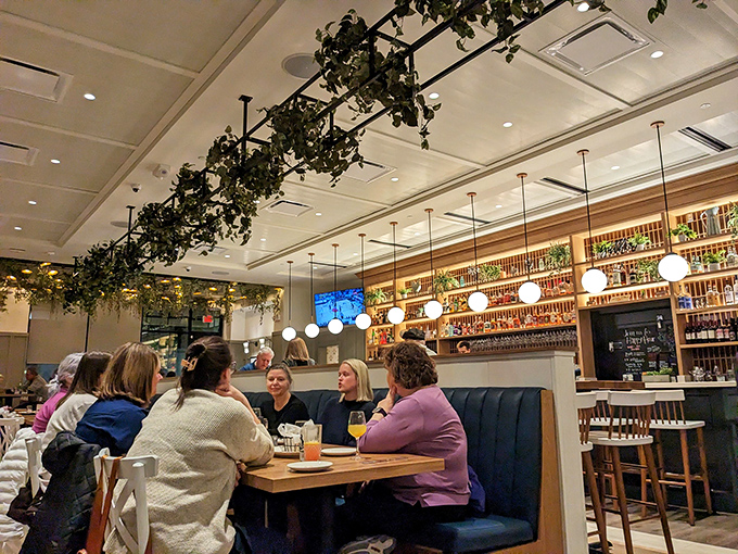 The true measure of a restaurant isn't just its food but the conversations it hosts&mdash;this table is clearly solving all the world's problems over biscuits.