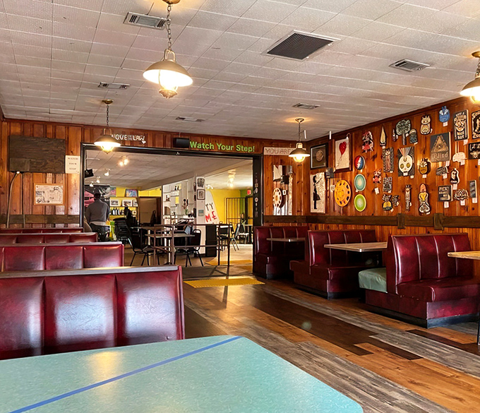 Red vinyl booths and wood-paneled walls&mdash;the universal language of "sit down and stay awhile."