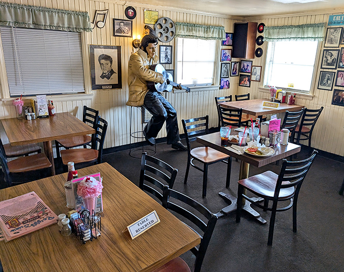 Another dining area where Elvis stands guard, guitar at the ready, as if waiting for your permission to serenade your stack of pancakes.