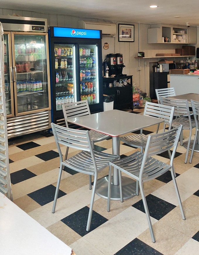 The dining area might not win design awards, but it's got something better&mdash;the aroma of fresh donuts and the satisfied sighs of people living their best lives.