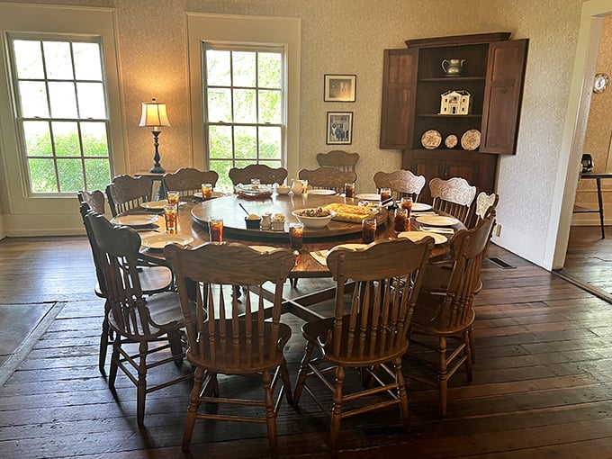 The communal table experience—where strangers become friends over passed platters and shared stories about their Tennessee adventures.