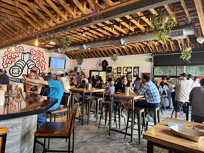 The dining room buzzes with the particular energy that only comes from a room full of people experiencing meat-induced euphoria simultaneously.