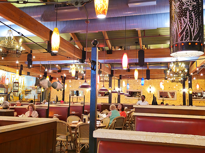 Exposed wooden beams, colorful pendant lights, and comfortable seating create the perfect backdrop for that "I'm-so-glad-we-came-here" moment.