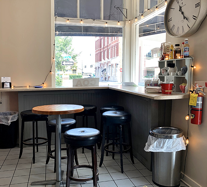 A corner nook by the window offers prime people-watching with your pastry—the original entertainment before Netflix existed.