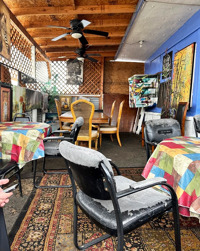 Mismatched chairs and colorful tablecloths create an atmosphere as authentic as the food. No interior designer needed when flavor is the focus.