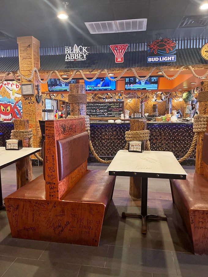 Booth seating that's witnessed countless seafood battles, each table telling stories of spice-stained fingers and satisfied smiles.