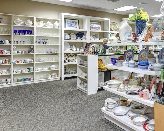 China and glassware arranged with museum-like precision. Your grandmother's pattern might be hiding here, waiting for a reunion.