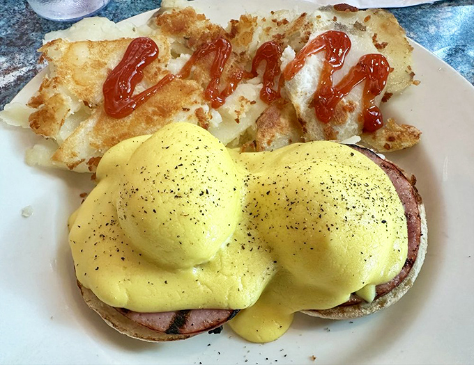 Eggs Benedict: where hollandaise sauce dreams come true and English muffins finally fulfill their destiny as breakfast royalty.