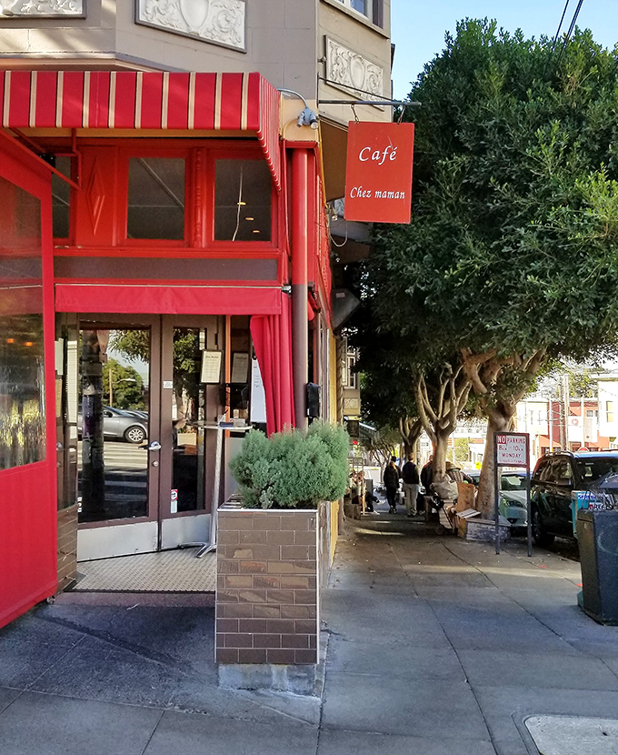 That red fa&ccedil;ade isn't just a color choice&mdash;it's a beacon for hungry souls seeking authentic French comfort in California sunshine.